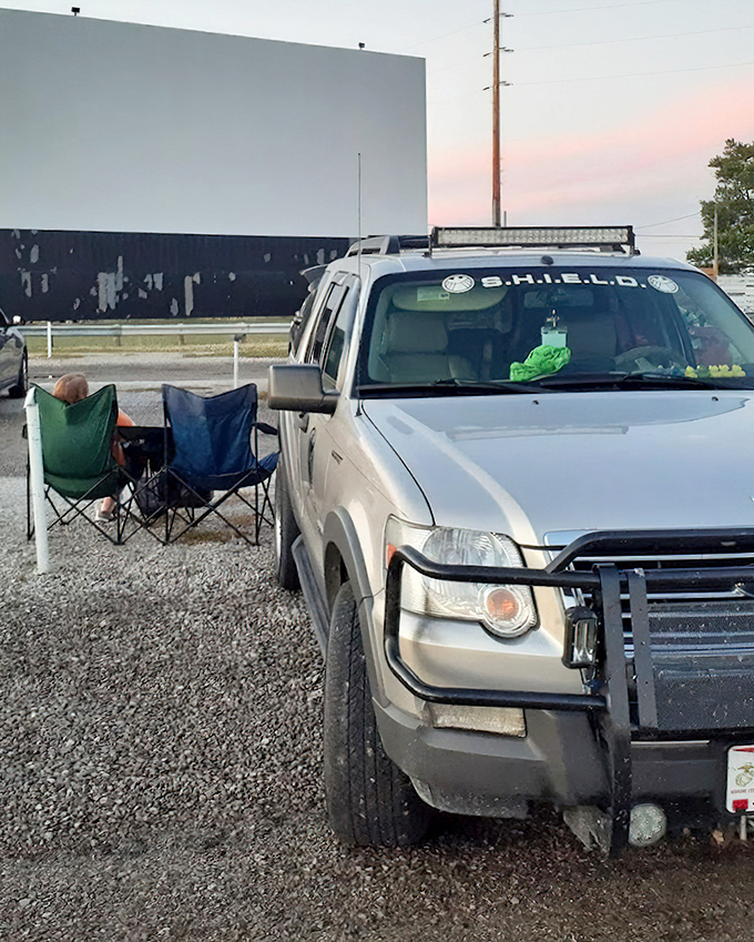 "Apply online now!" The pre-show ads are part of the charm at this classic American drive-in experience.