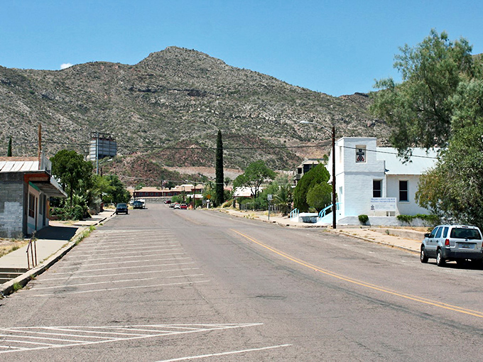 Small-town charm with big mountain views! This former mining community offers authentic Arizona living where your Social Security check stretches like the desert horizon.