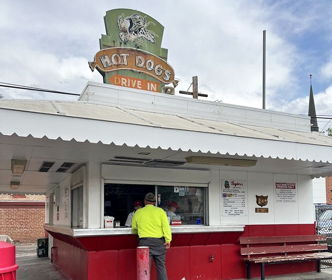 Taylor Bros' retro sign glows like a beacon for road-trippers seeking that perfect Central Valley hot dog fix.