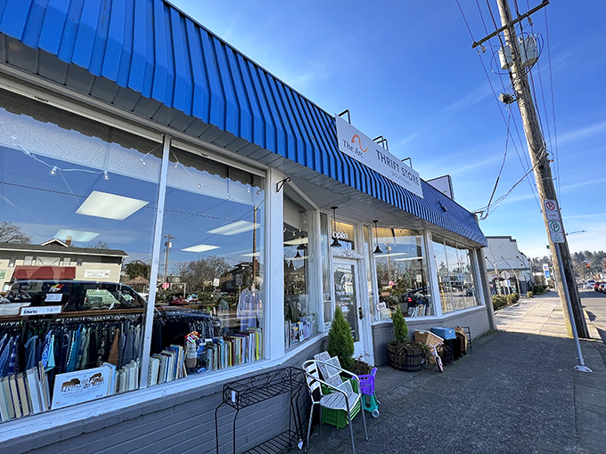 The Arc's bright blue awning signals bargain territory ahead, like a beacon for thrifty shoppers.
