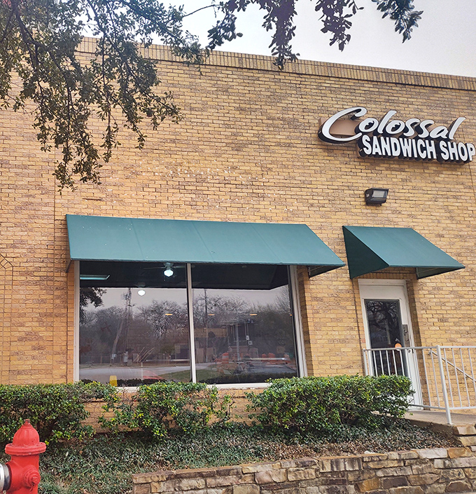 Hiding in plain sight, Colossal Sandwich Shop's humble brick exterior gives no hint of the mammoth creations waiting inside.