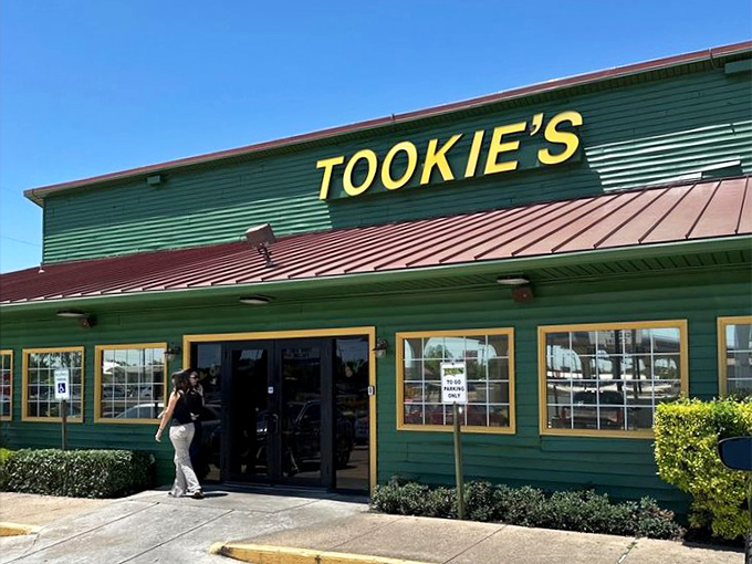 Tookie's bold green exterior stands out like a beacon for burger pilgrims. The yellow trim says "happiness served here!"