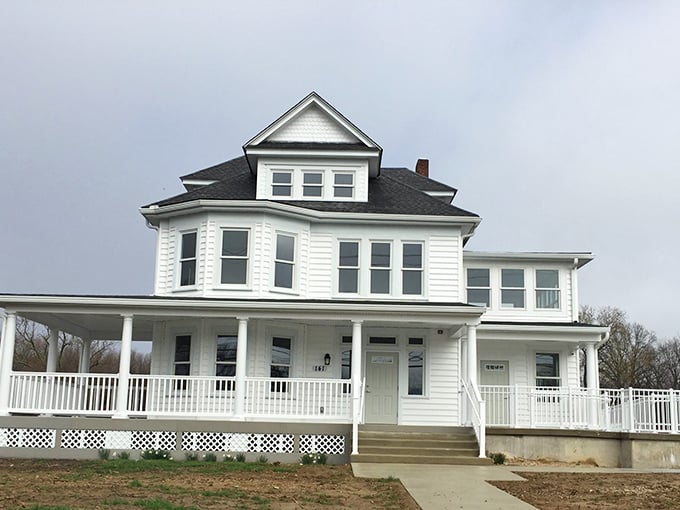Townsend's pristine white homes with American flags speak to a simpler time, when neighbors chatted across white picket fences.
