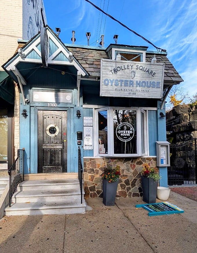 Trolley Square Oyster House looks like it sailed right out of a New England postcard with its charming blue facade.