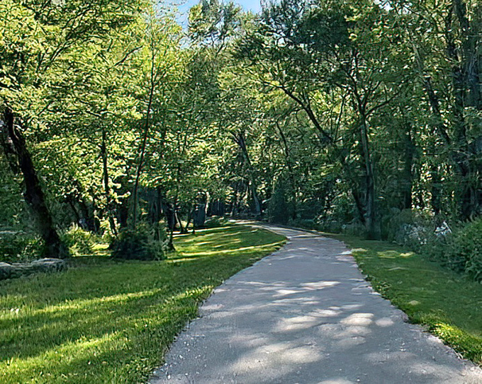 The Wabash River Trail &ndash; where dappled sunlight plays hide-and-seek through a cathedral of green. Nature's air conditioning at its finest!