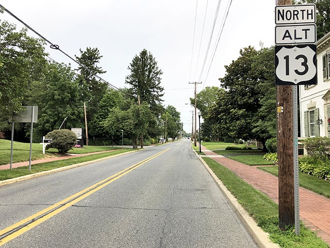 Route 13 cuts through small towns where history whispers from every storefront. No GPS needed&mdash;just follow the stories.