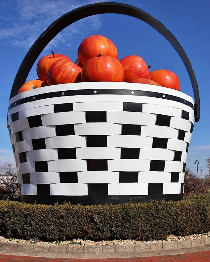 This colossal wicker basket overflows with giant apples, celebrating Ohio's agricultural heritage in gloriously oversized fashion.