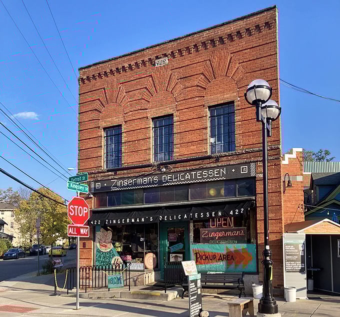 Behind this historic brick facade lies a deli empire that's redefined sandwich artistry for generations.