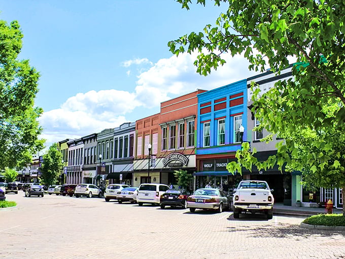 These brick facades have watched generations pass by, keeping their small-town secrets and reasonable rents.