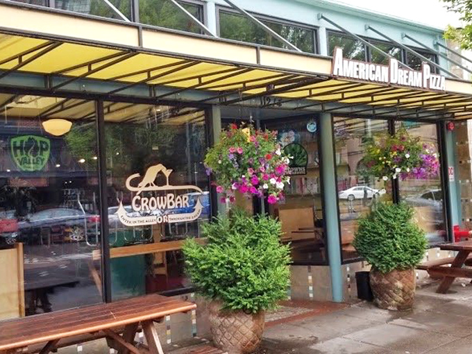 Flower pots and string lights transform American Dream's exterior into the kind of place where pizza memories are made.