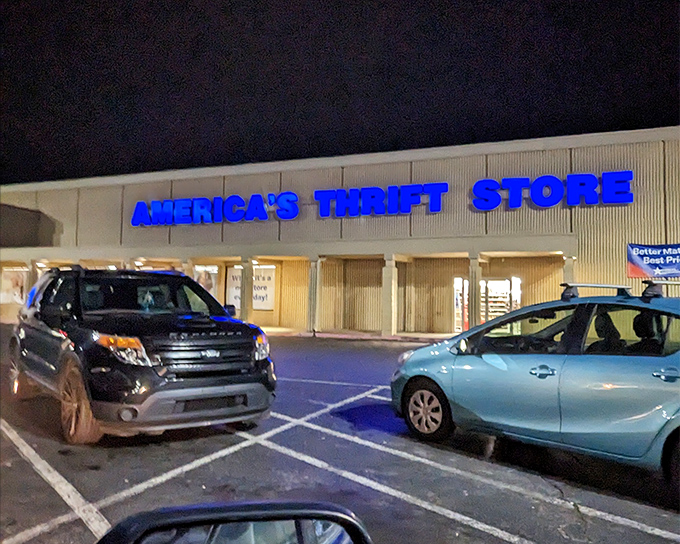 Night falls, but the thrift hunt continues! The blue glow of this sign is like a lighthouse guiding ships of shoppers to safe harbor.
