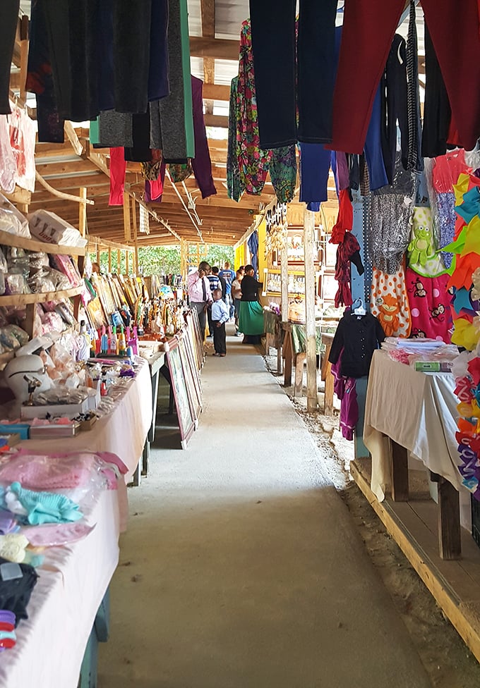 Clothing rainbow! Bill's vendors display their wares with colorful flair, turning shopping into a vibrant treasure hunt.