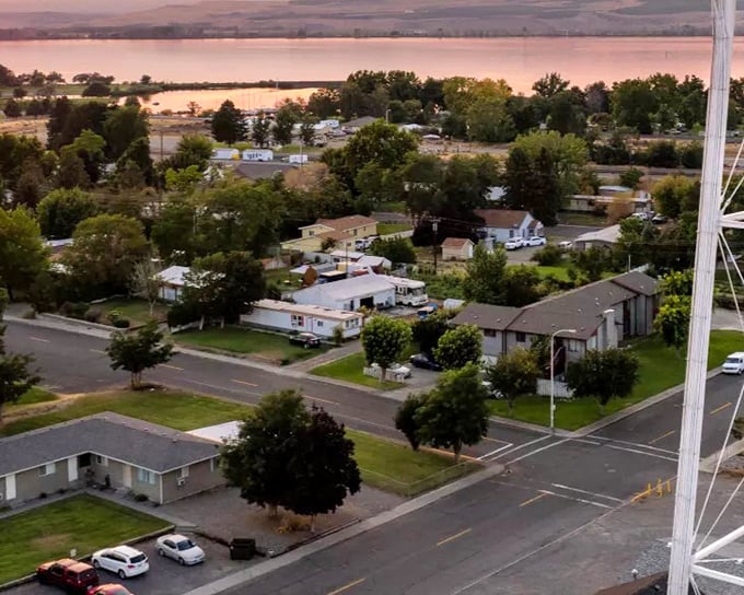 Boardman's buildings and residential houses stand like steadfast guardians of small-town values, where rush hour means three cars at a stop sign.