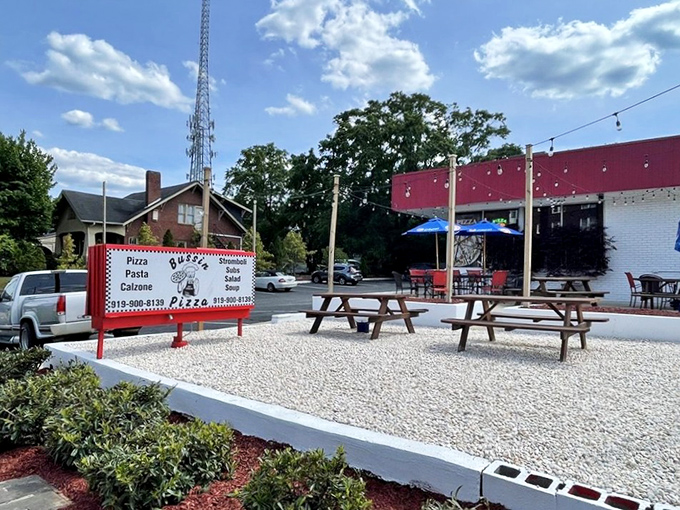 Where pizza meets picnic tables. The kind of unpretentious spot that reminds you great food doesn't need fancy surroundings.