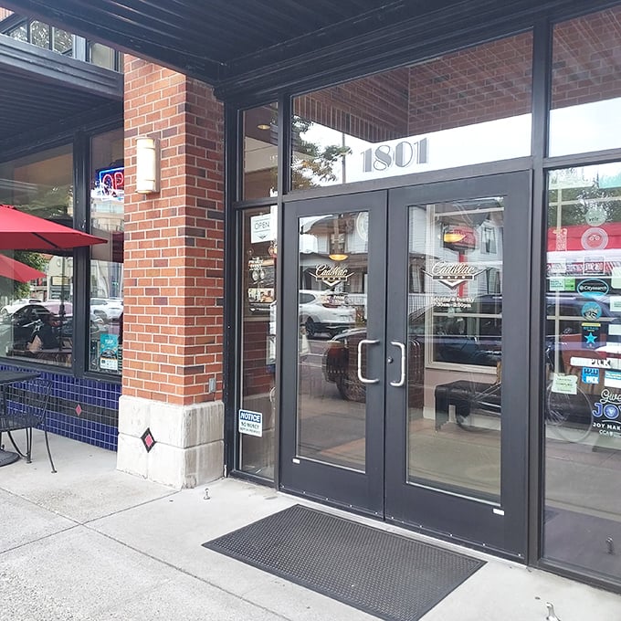 Where classic architecture meets classic breakfast &ndash; Cadillac Cafe's entrance promises a dining experience that's both elegant and comforting.