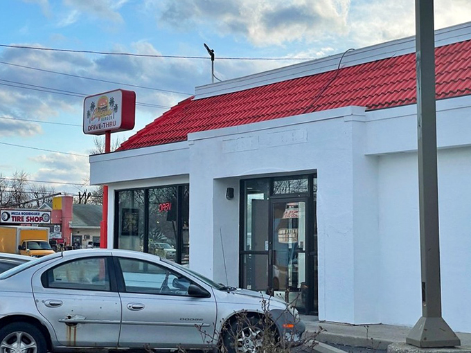 The classic drive-thru with its bright red roof &ndash; where burger traditions are honored and appetites are satisfied.