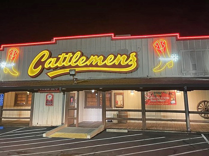 When the evening lights hit Cattlemen's facade, you can almost hear the sizzle of perfectly seasoned steaks calling your name.