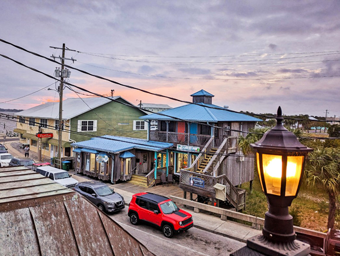 Cedar Key's main street might be the only place in Florida where traffic jams involve golf carts and the biggest rush is getting to the dock for sunset.