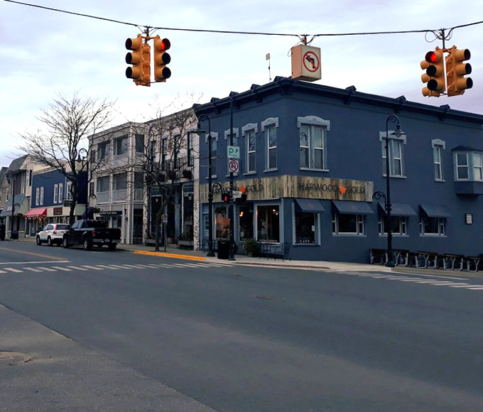 This charming downtown corner looks frozen in time, where vintage architecture meets small-town serenity.