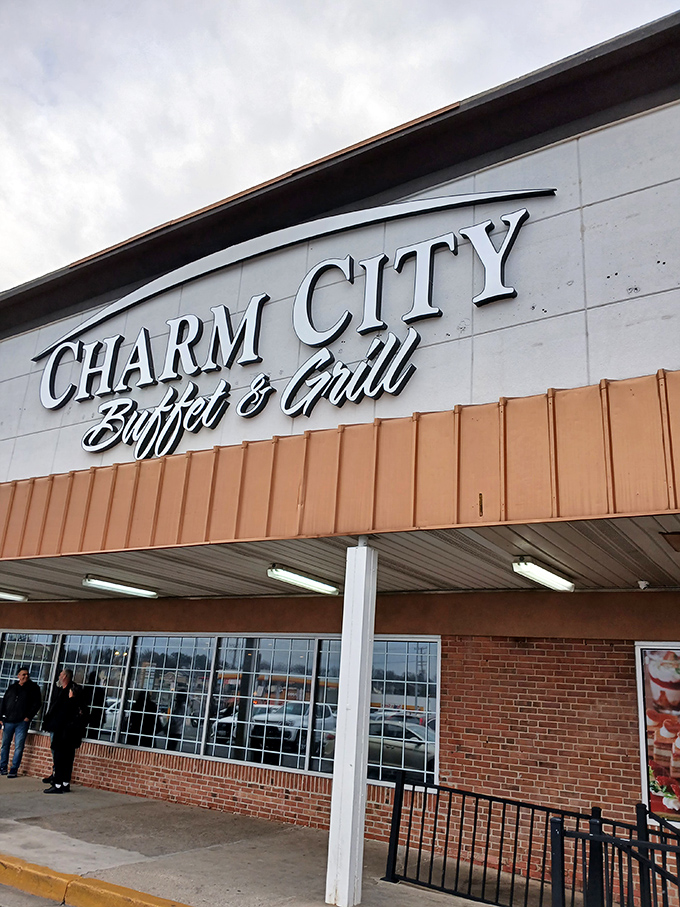The sleek signage of Charm City Buffet & Grill shines against the sky. Like a lighthouse guiding hungry sailors, it beckons those seeking refuge from cooking their own dinner. 