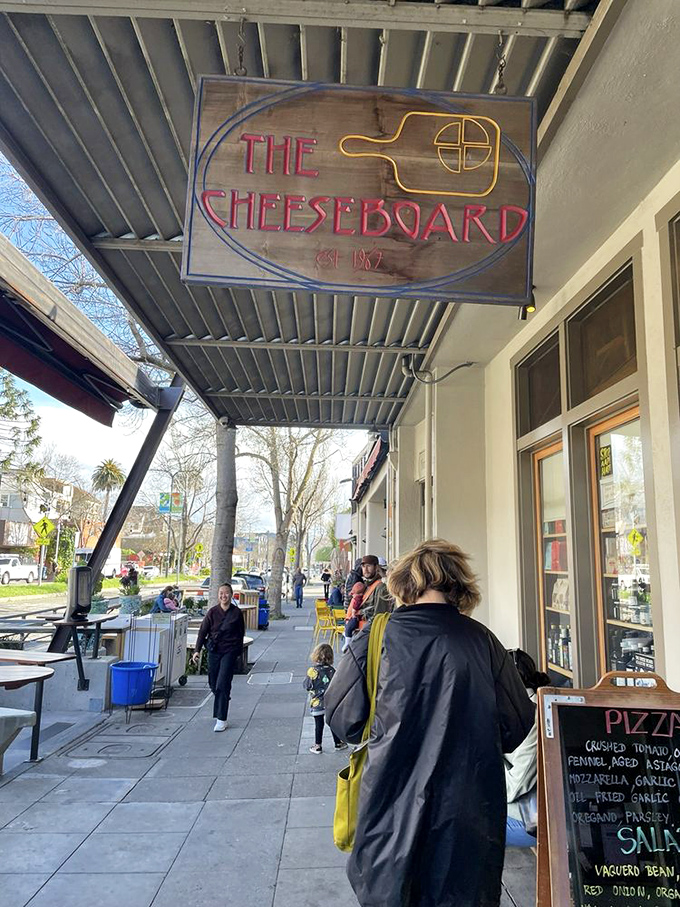 Beneath The Cheese Board&rsquo;s iconic sign, jazz meets pizza in perfect harmony. Its daily creations inspire lines that have become part of Berkeley&rsquo;s cultural fabric.