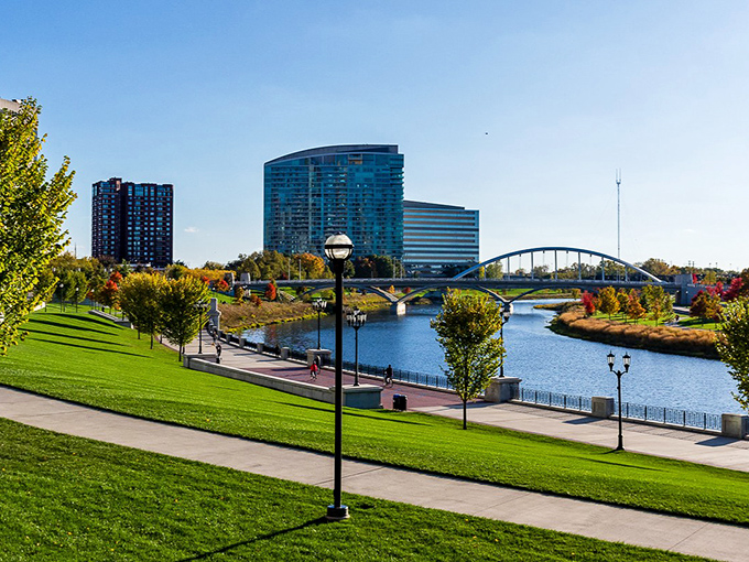The Scioto River reflects Columbus's skyline like nature's mirror. A city where your retirement fund and quality of life can peacefully coexist.