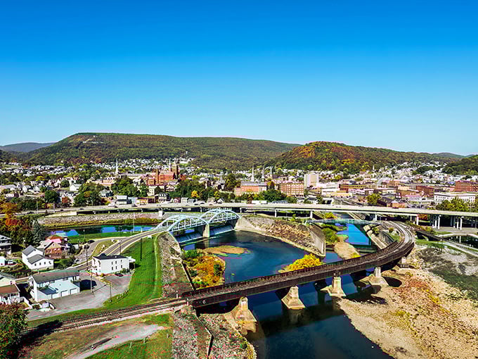Fall colors paint the mountainside behind Cumberland like nature's own Hollywood backdrop come to life.