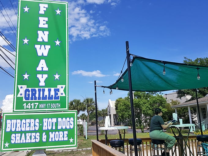 Fenway Grille: That bright green sign against the blue sky promises beach-friendly hot dogs worth writing home about.