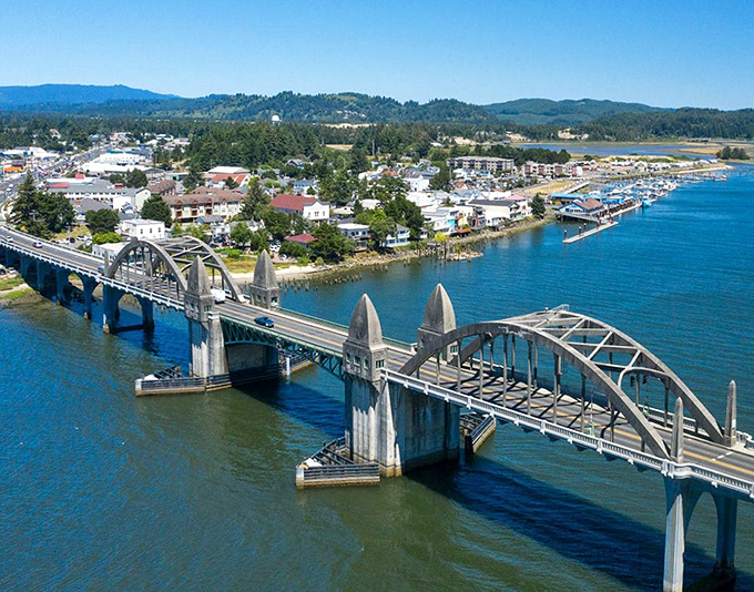 The view from above reveals Florence's perfect positioning—nestled between river, ocean, and forest without the premium price tag.