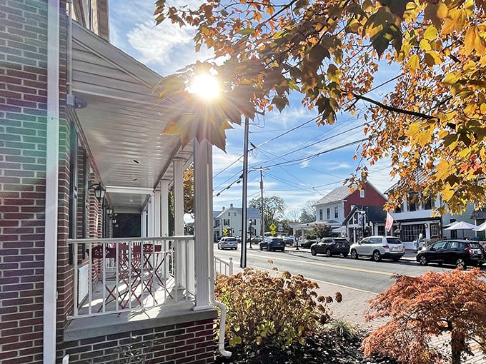 Fall colors frame Gettysburg's historic thoroughfare, where modern cars travel roads once walked by soldiers and presidents alike.