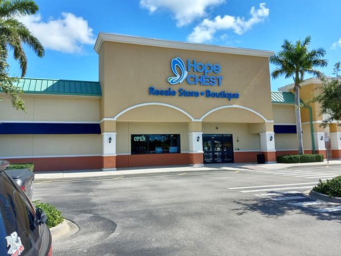 Hope Chest Thrift Store gleams in the Florida sunshine. The "Open" sign beckons like a friendly invitation to a more affordable retail therapy.
