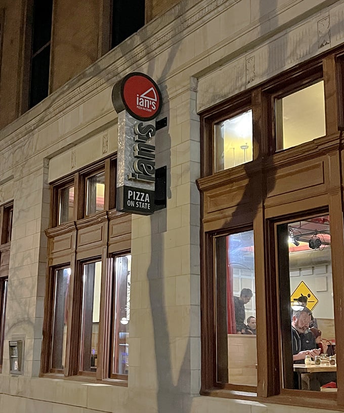 At night, Ian's windows glow with promise, beckoning hungry Madisonians toward slices bigger than your plans for tomorrow.