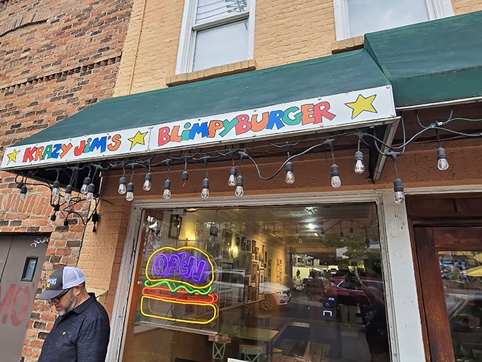 The neon burger sign glowing in Krazy Jim's window &ndash; like a lighthouse guiding hungry souls to slider salvation.
