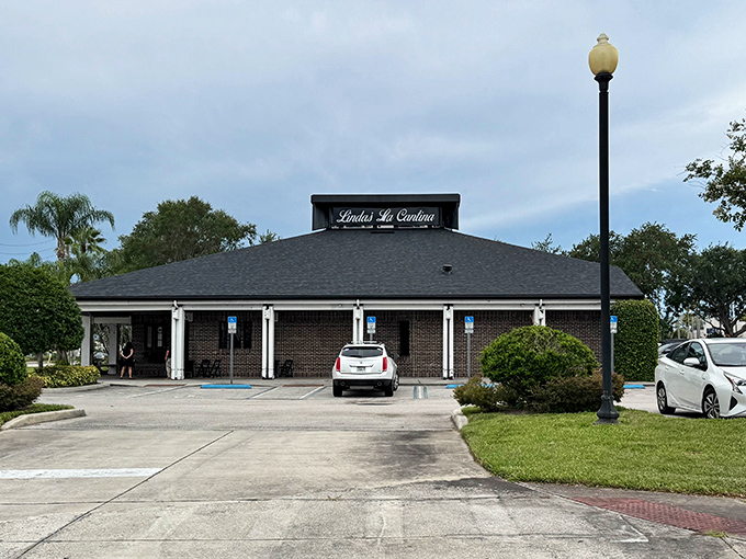 That brick exterior has been keeping steak secrets since before Disney knew what a FastPass was.