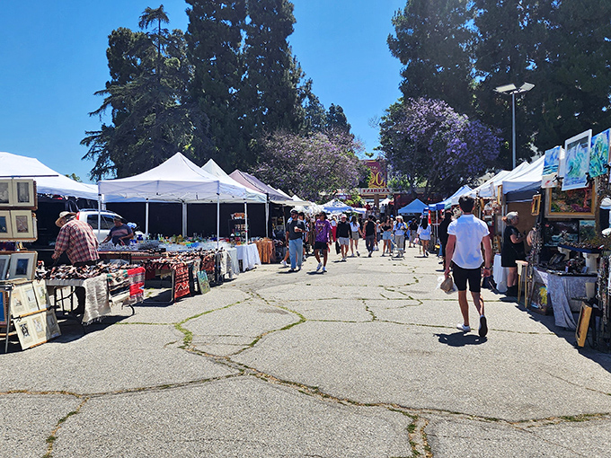 Art meets commerce at this vendor's stall. Framed paintings and unique collectibles await their forever homes at Melrose Trading Post.