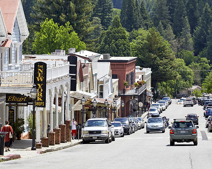 The street that time forgot! Nevada City's historic thoroughfare feels like walking through a Western film set where Elixart replaced the saloon but kept the magic.