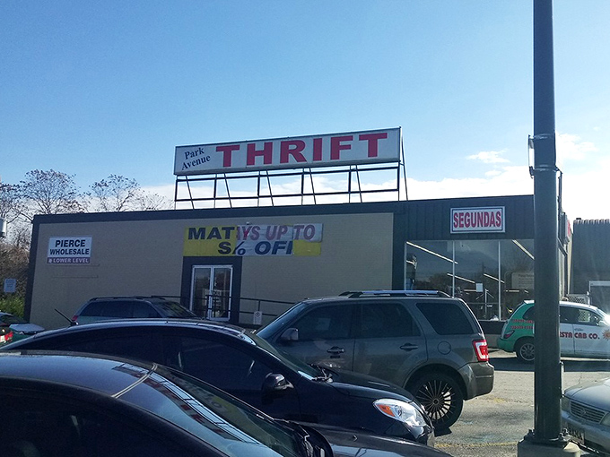 The blue sky matches the blue-light special feeling you get when Park Avenue Thrift advertises "up to 50% off."