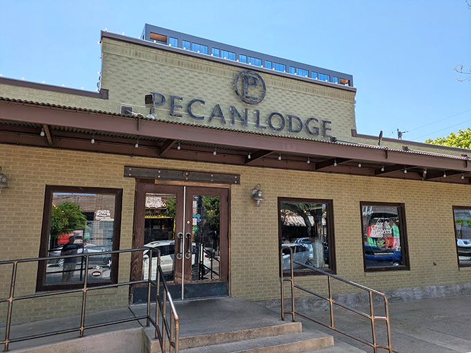Pecan Lodge (Dallas): Where city sophistication meets smoky tradition. The brick exterior hides flavor explosions within.
