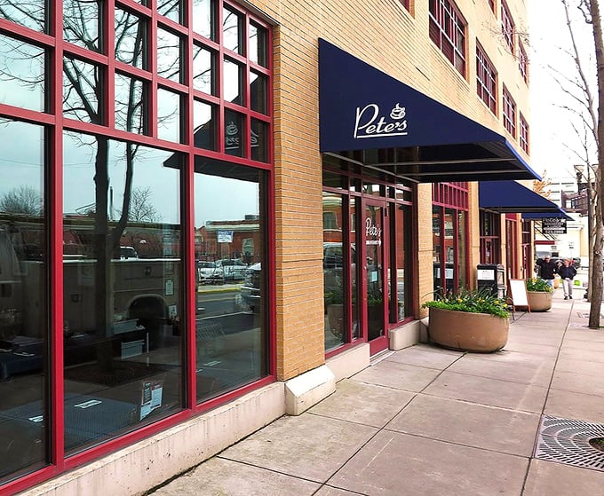 Those big windows let morning light dance across tables where breakfast dreams come true daily.