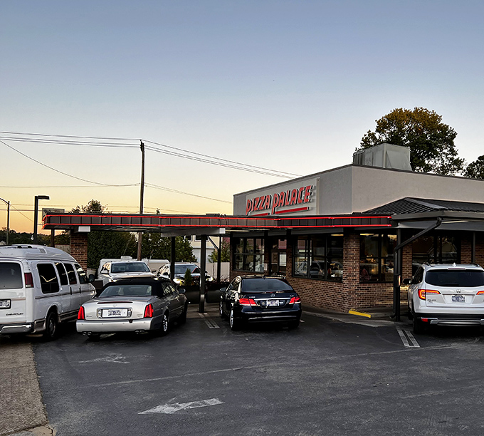 That glowing Pizza Palace sign has been guiding hungry Knoxville locals to pizza paradise since the Kennedy administration.