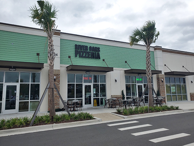 Outdoor tables waiting for pizza lovers to create memories. The kind of place where "just one more slice" becomes family tradition.