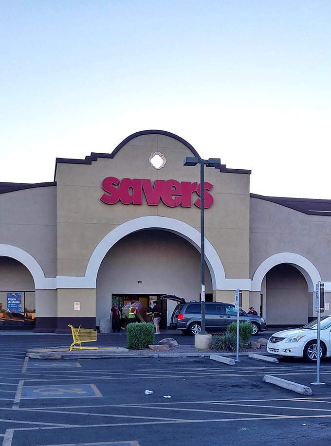 The classic Savers storefront gleams in the Arizona sunshine, promising air-conditioned treasure hunting inside.