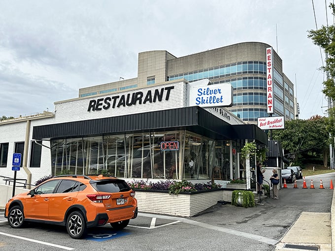 That classic white building with "RESTAURANT" in bold letters? It's Atlanta's time machine to breakfast's golden age.