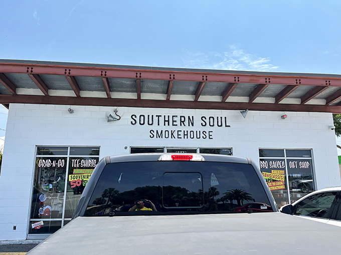 Clean white walls and a straightforward sign&mdash;because when your barbecue speaks this loudly, the building can whisper.