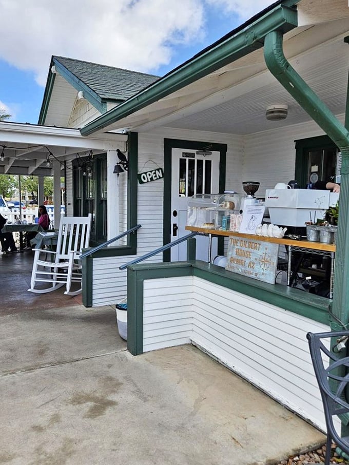 A welcoming porch with rocking chairs invites you to slow down before diving into breakfast heaven at this converted home-turned-restaurant.