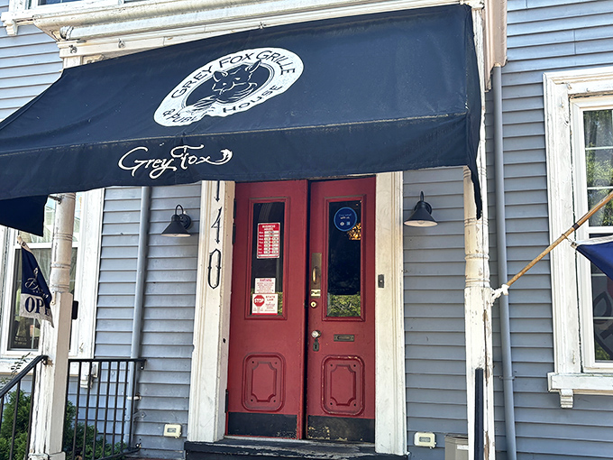 That iconic black awning and red door? It's like the velvet rope to Dover's most delicious burger club.