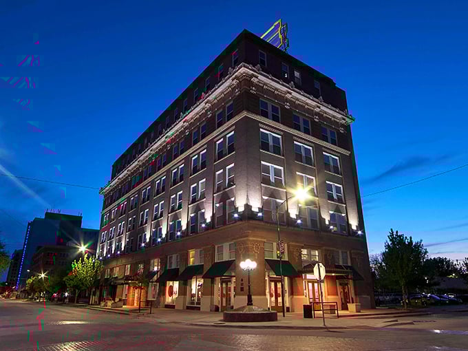 The beautifully lit buildings of Wichita Falls glow against the evening sky&mdash;classic architecture meets modern charm in this downtown gem.