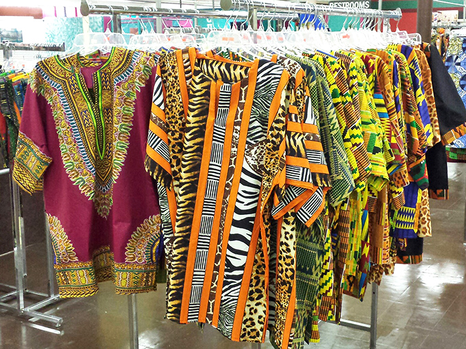 A kaleidoscope of African prints transforms ordinary clothing into wearable art. Cultural expression never looked so vibrant.