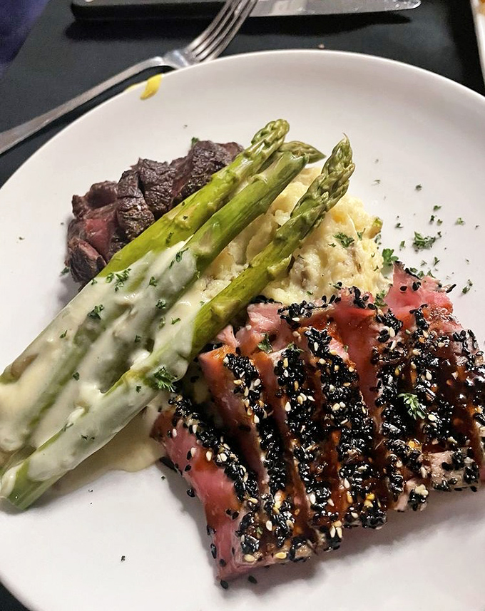 Sesame-crusted tuna and perfectly seared beef share plate space with asparagus bathed in hollandaise&mdash;a surf and turf romance for the ages.