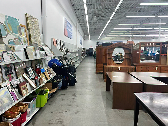 Where furniture finds new life! Vintage sofas and sturdy dining sets create an impromptu showroom, each piece whispering stories of dinners past.